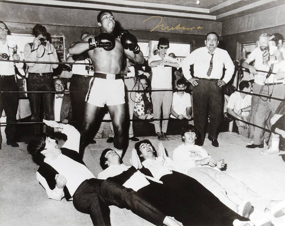 MUHAMMAD ALI & THE BEATLES, photograph of Ali standing over The Beatles ...