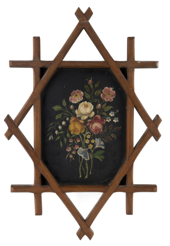 A tramp art timber frame made to hold an oil painting (of flowers) on ...