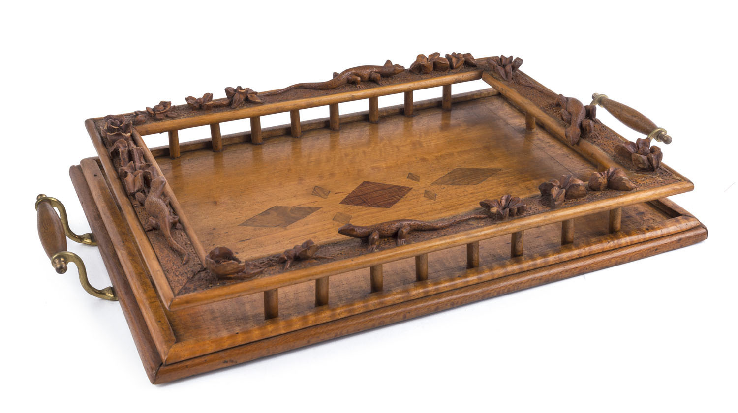An Australian serving tray with carved gallery adorned with flowers and ...