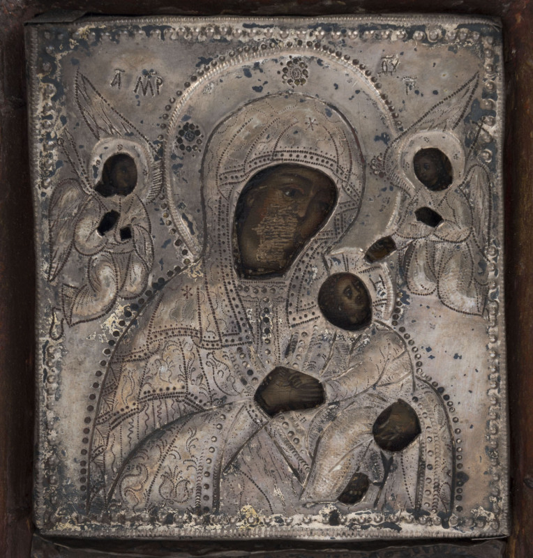 An antique Russian silver triptych icon, 18th century, 17cm high, 22cm wide