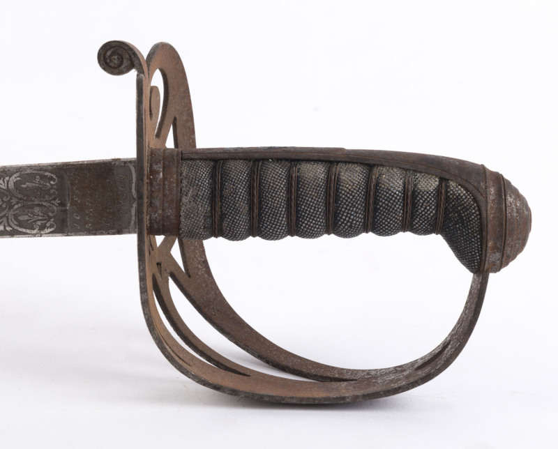 A military parade sword with acid etched blade and engraved scabbard by ...