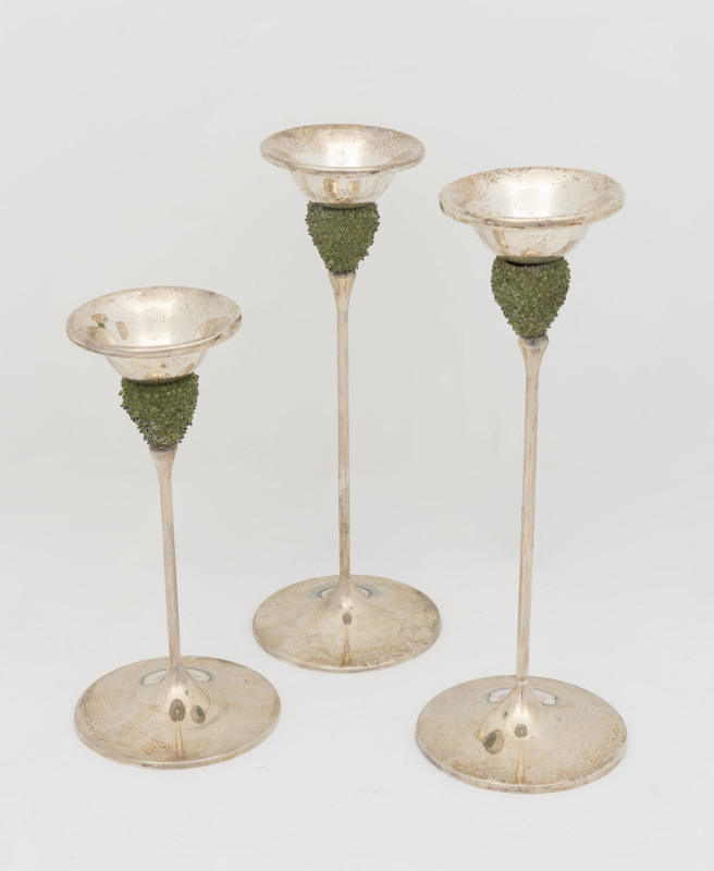Set of three sterling silver candlesticks with green crystalline glass ...