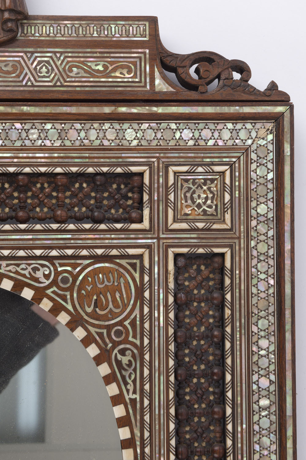 A stunning antique Middle Eastern wall mirror, turned and carved timber ...