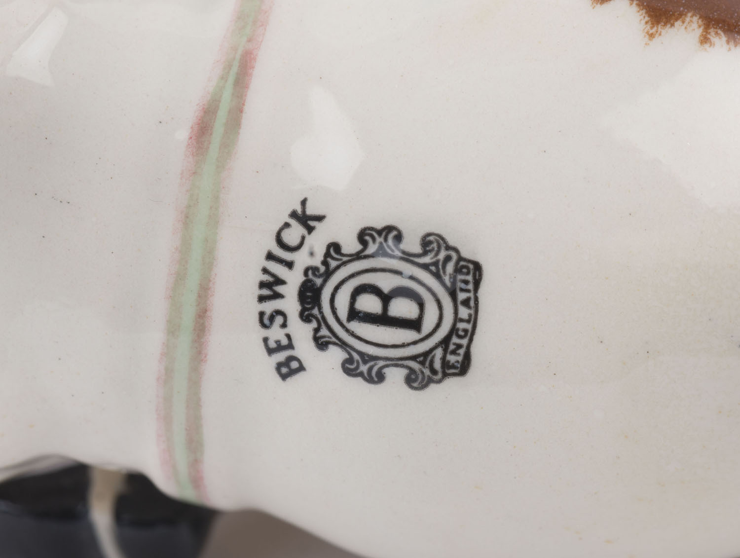 BESWICK porcelain statue of a girl riding a pony, black factory mark to ...