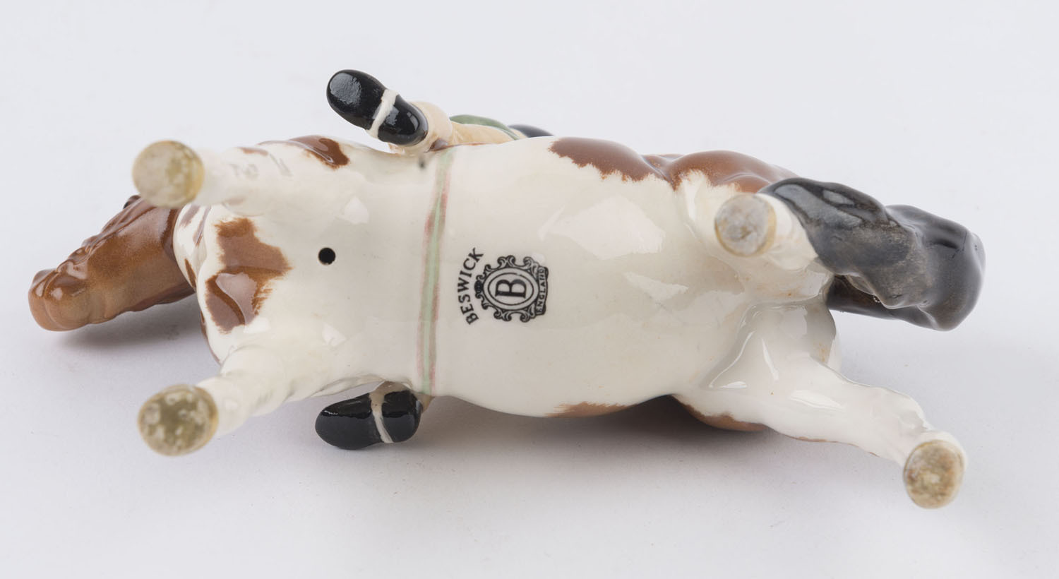 BESWICK porcelain statue of a girl riding a pony, black factory mark to ...