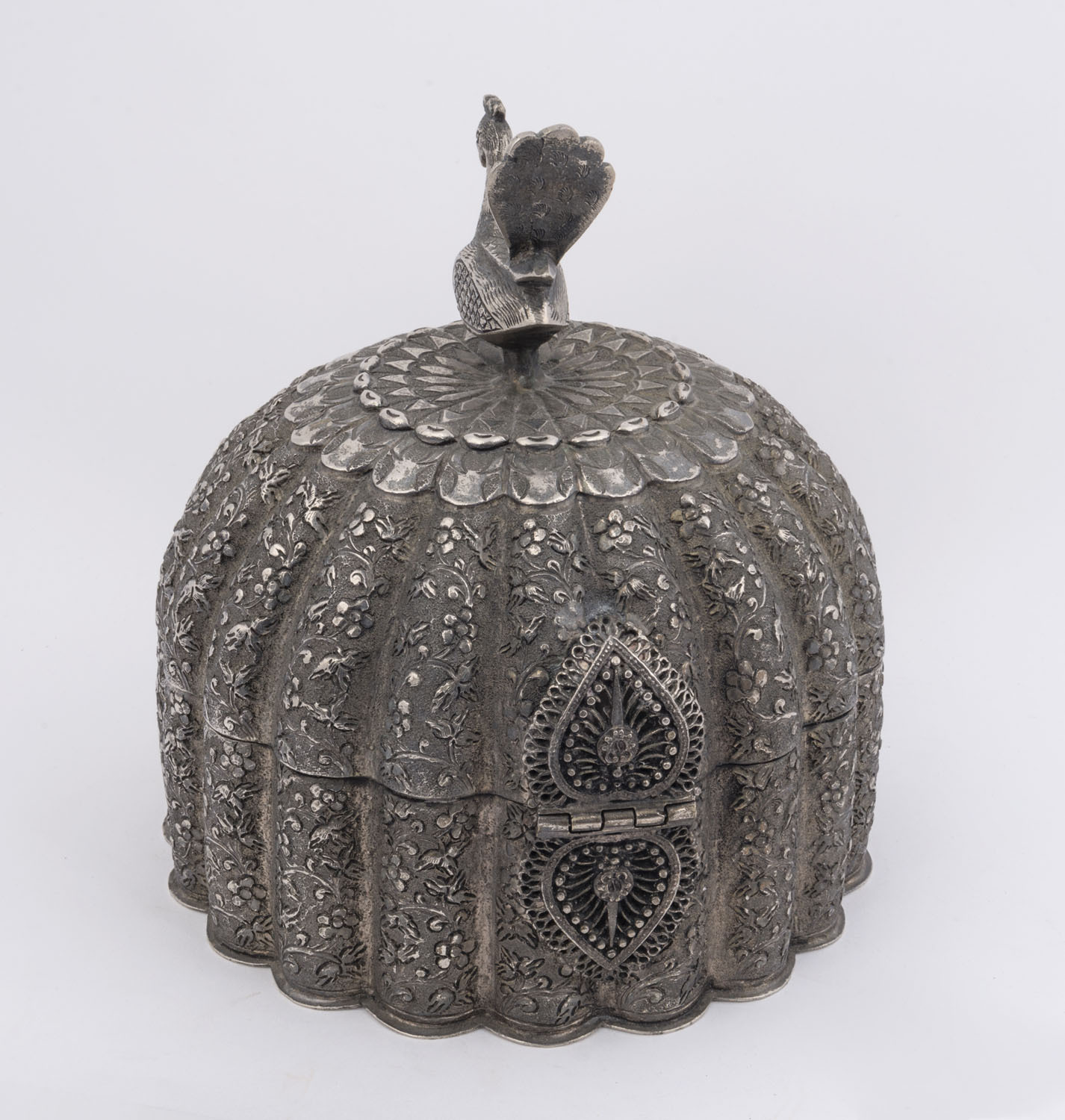 A fine North Indian silvered metal casket with peacock finial, 19th ...