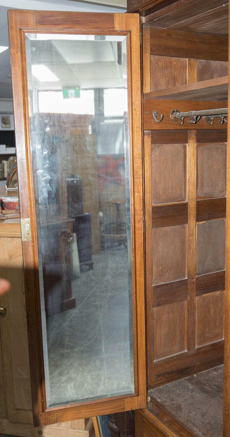 An Australian Arts & Crafts wardrobe, fiddleback blackwood with copper ...