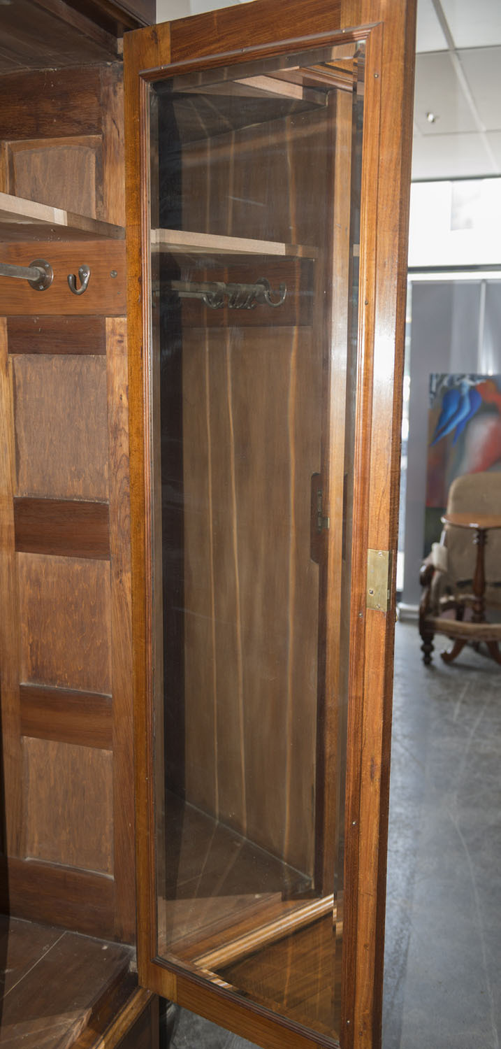 An Australian Arts & Crafts wardrobe, fiddleback blackwood with copper ...