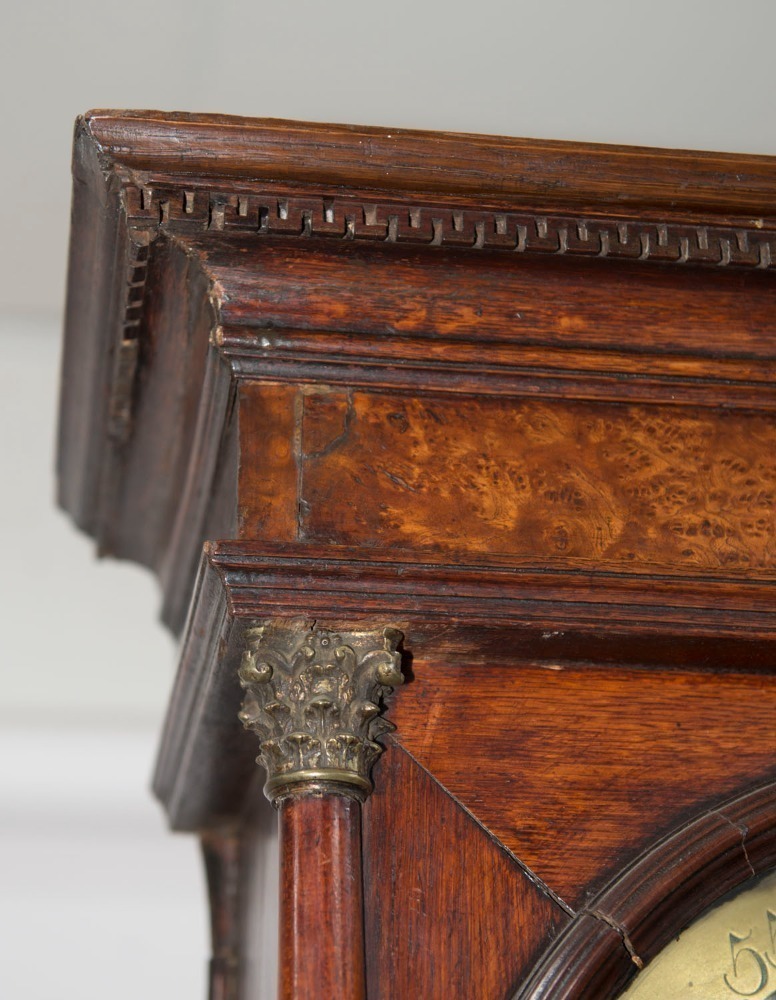 An antique English twin weight long-case grandfather clock with ...