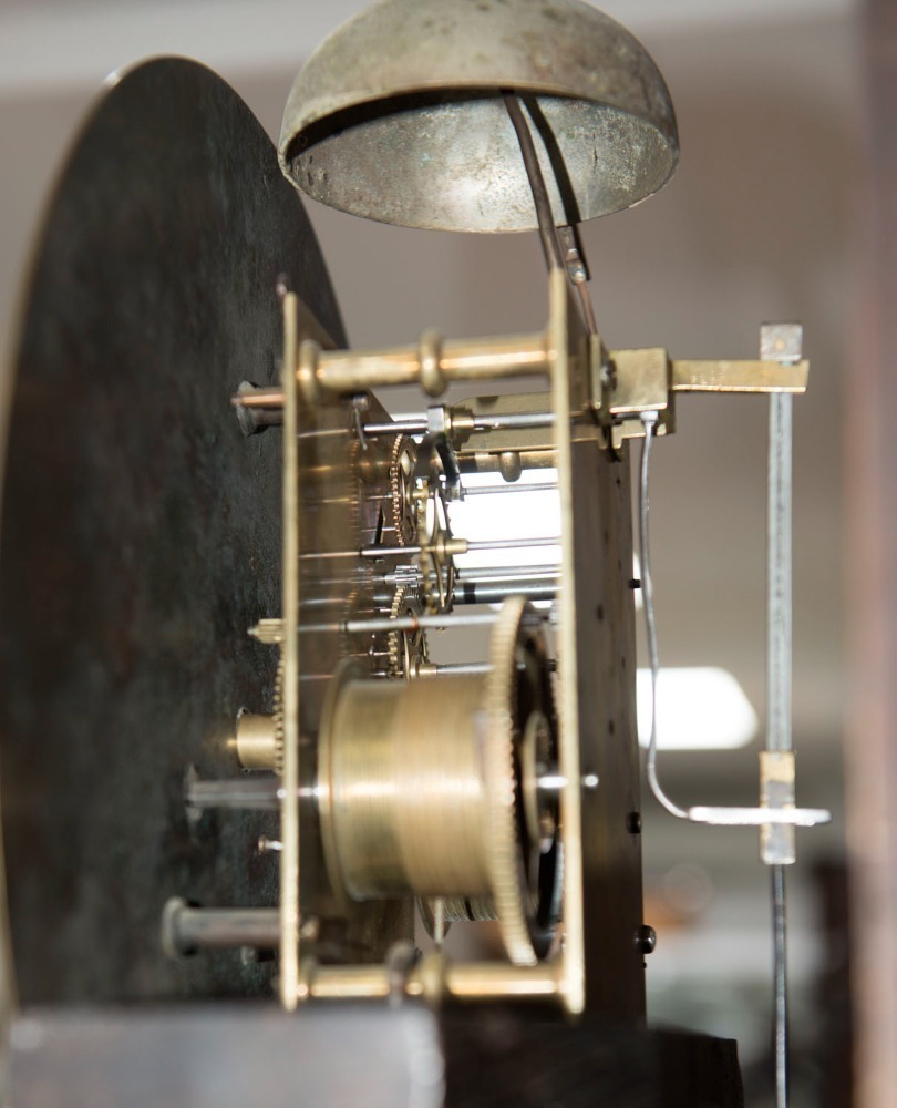 An antique English twin weight long-case grandfather clock with ...