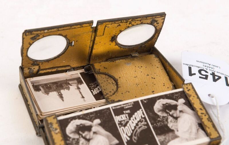 ROTOSCOPE pocket stereo viewer with cards, circa 1910, 7.5cm high