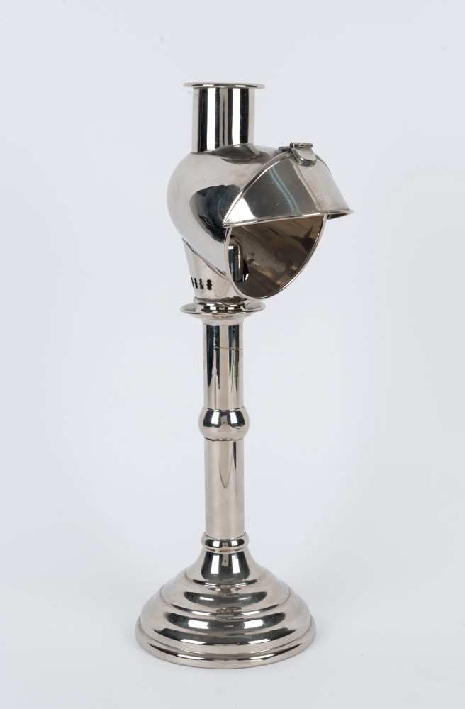 An English nickel plated students candle lamp with original hood and ...