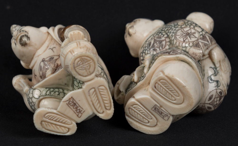 Two Japanese carved ivory statues with hand-coloured finishes, 20th ...
