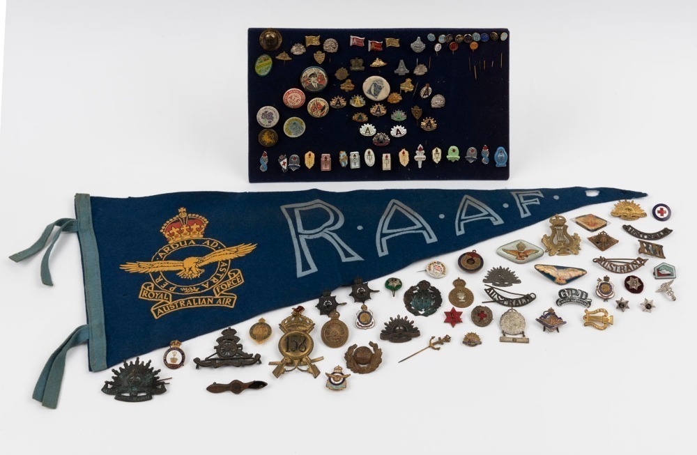 RAAF pennant, military badges, and pins etc (100 items)