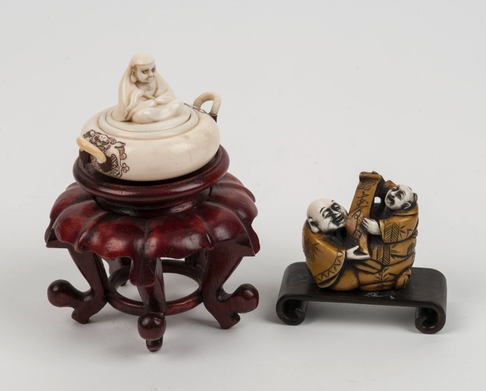 A Japanese ivory netsuke with stained finish, together with a Japanese ...