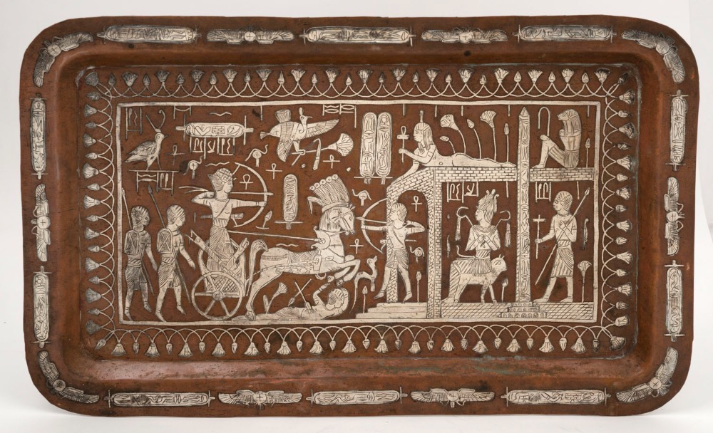 An antique Egyptian copper serving tray profusely inlaid with silver ...