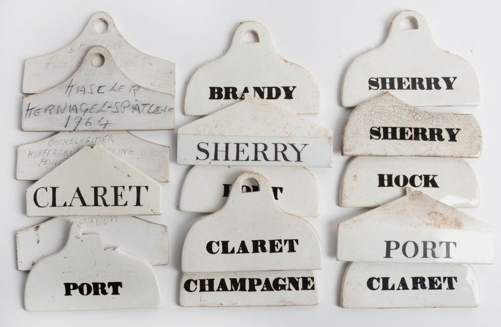 CELLAR BIN LABELS. Group of ten antique porcelain labels together with ...