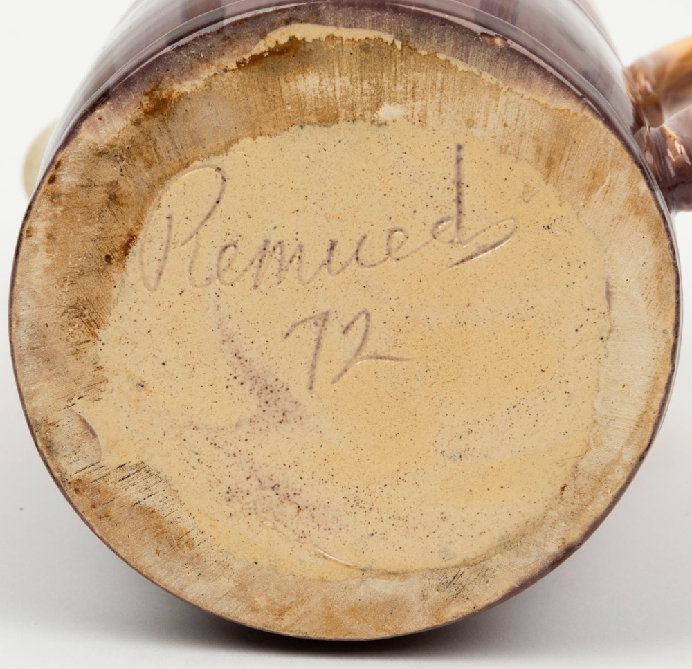 REMUED pottery jug with mauve and cream glaze, incised Remued 72 ...