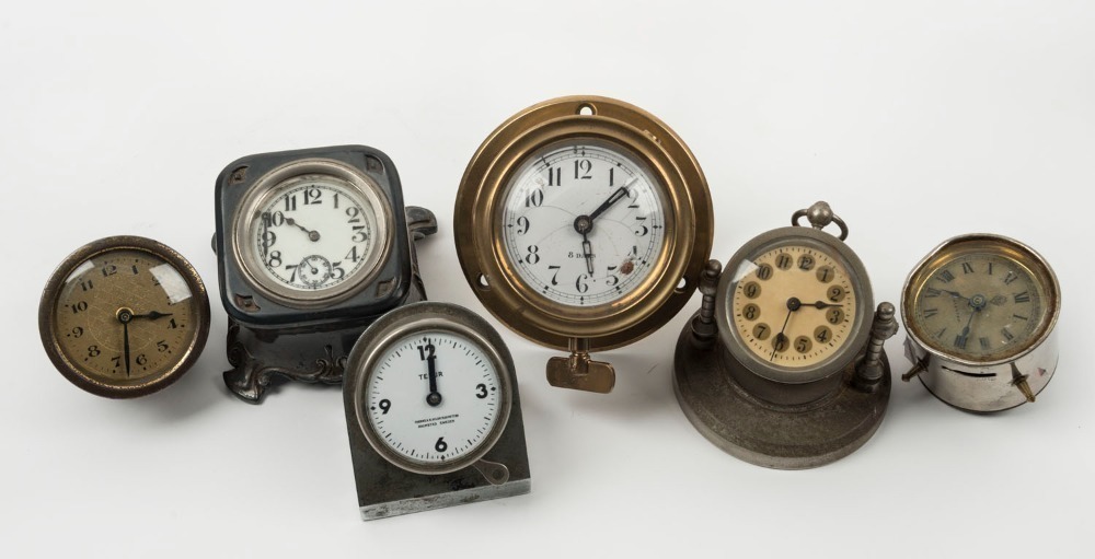 Six assorted antique and vintage clocks in metal cases, mixed condition, 19th/20th century, the ...