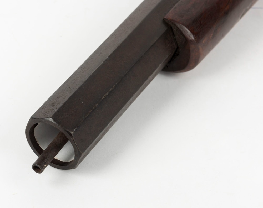 An antique percussion cap line-throwing gun with octagonal barrel, mid ...
