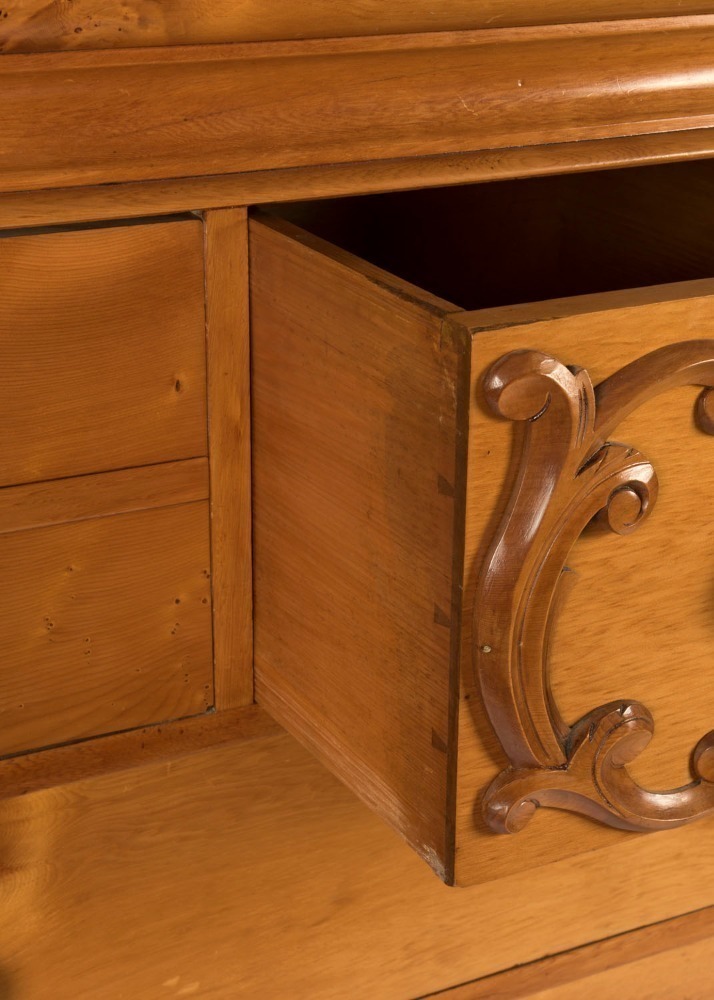 An antique Australian huon pine eight drawer chest with carved corbels ...