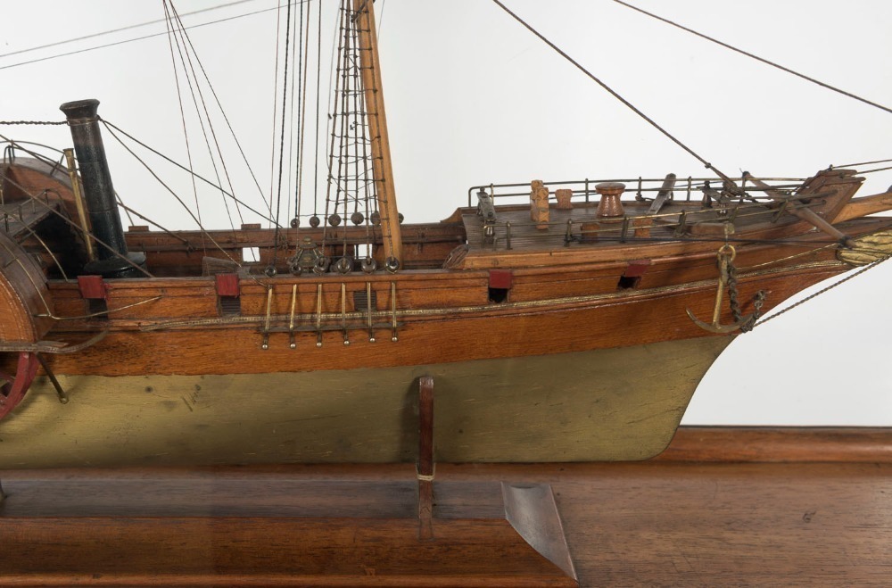 An antique Australian model steam powered sailing ship, housed in a ...