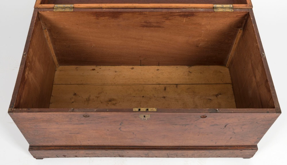 An antique Australian cedar flip-top trunk with string and barber pole ...