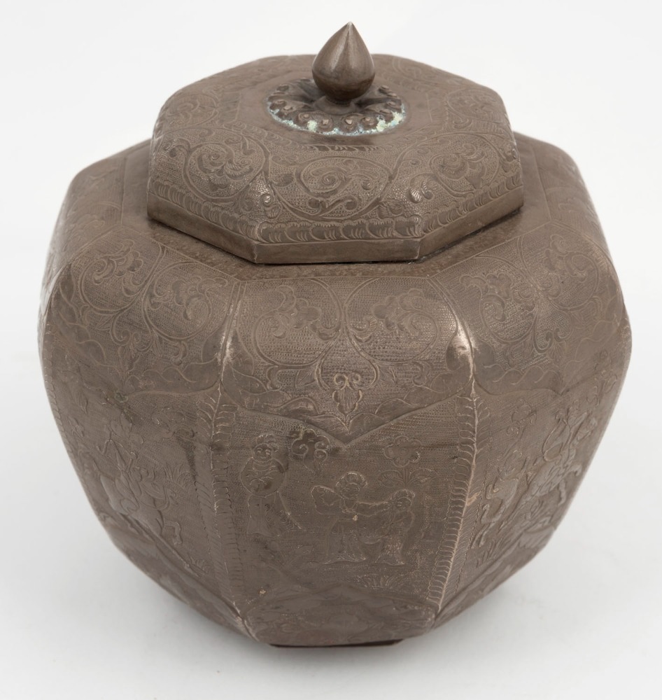 An antique Chinese silver lidded tea caddy of octagonal form with ...