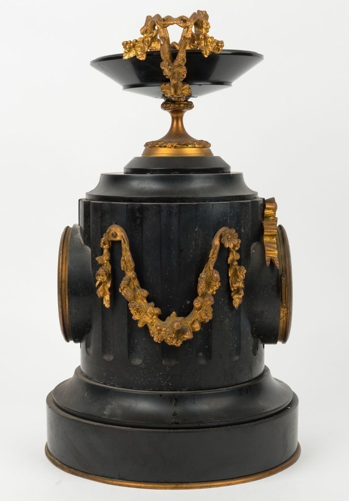 An antique French urn shaped mantle clock, black slate with ormolu ...