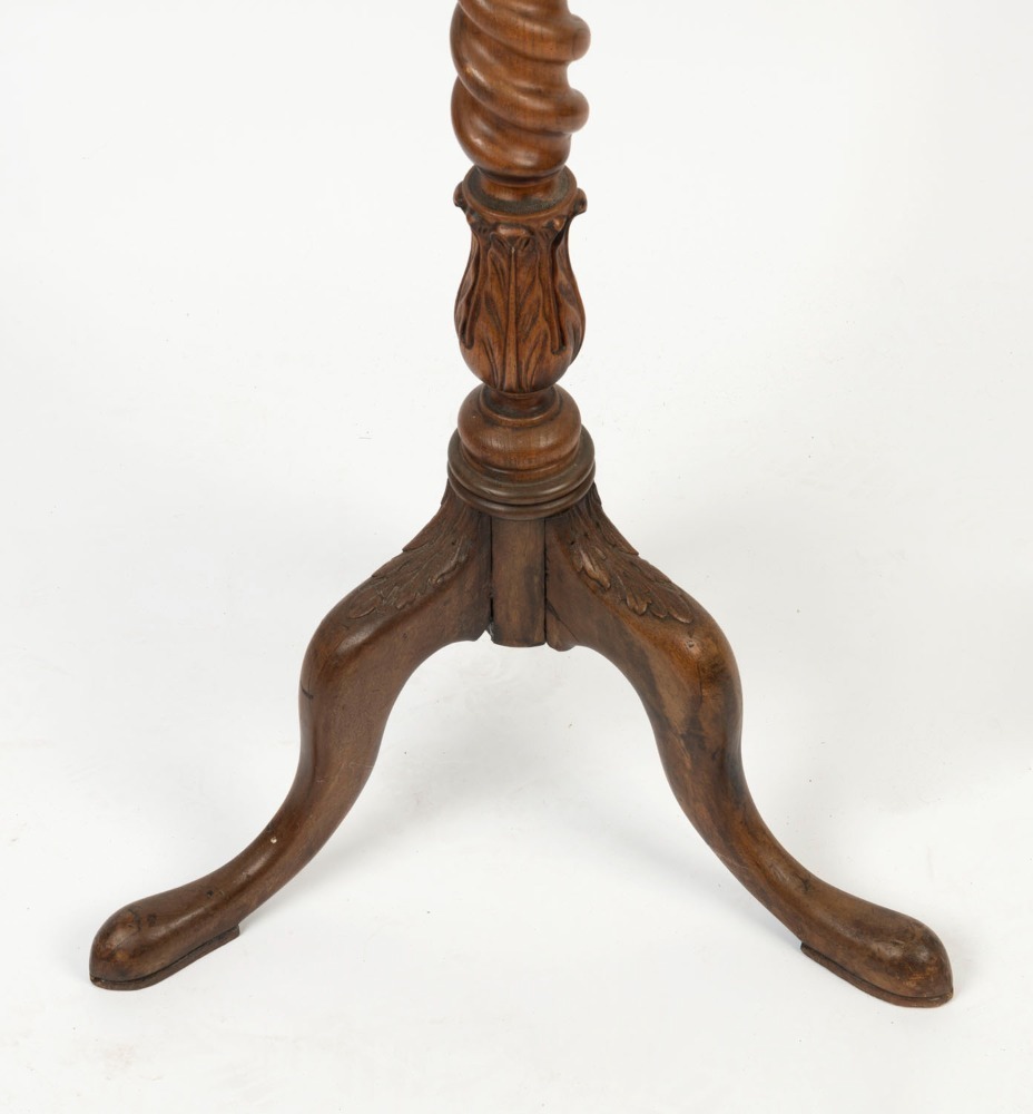 An antique mahogany torchier with barley twist column, 19th/20th ...