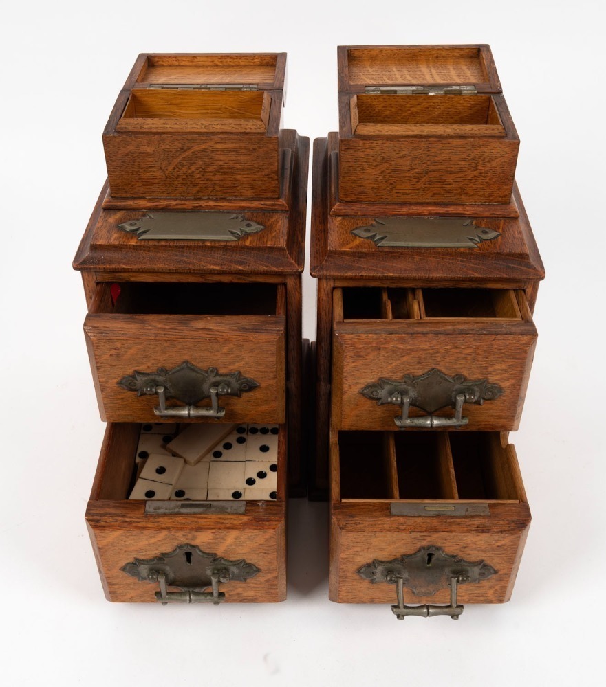 A pair of antique oak gaming boxes with two antique whist scorers, plus ...
