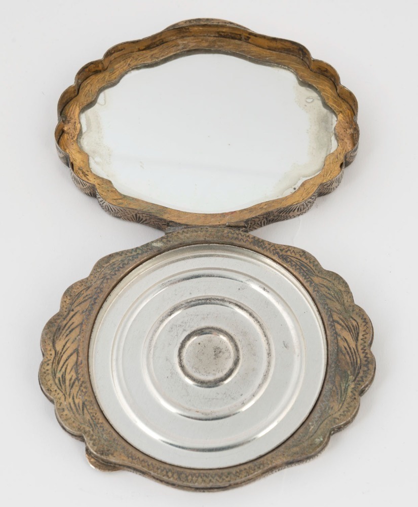An Italian silver and enamel powder compact, 20th century, 9.5cm wide