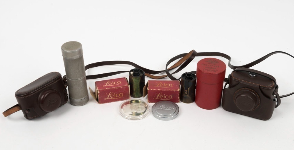 LEITZ: Ten Leica items - two FILCA film cassettes in metal canisters ...