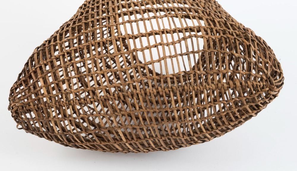 Eleven assorted woven baskets including examples sold by Elcho Island ...