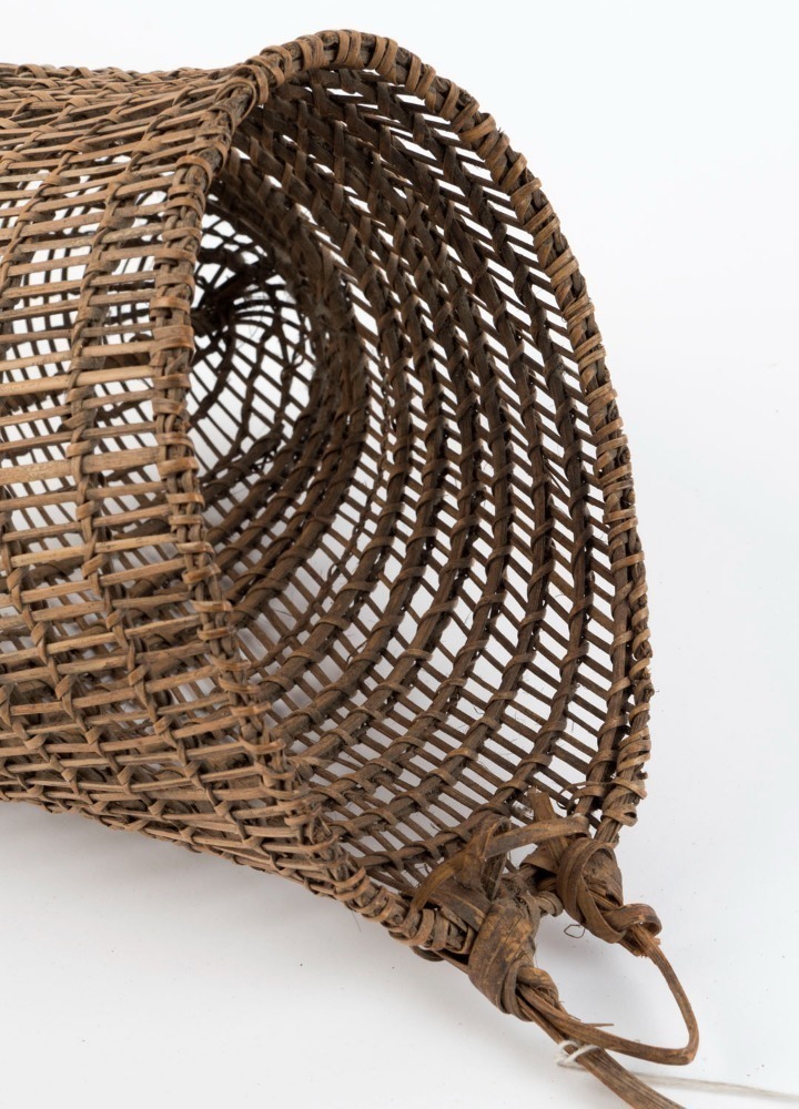 Eleven assorted woven baskets including examples sold by Elcho Island ...
