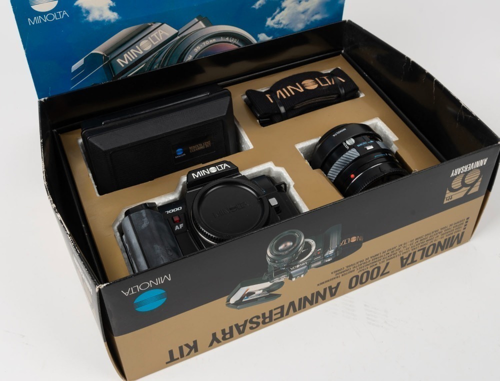 MINOLTA: Circa 1985 Minolta 7000 AF Anniversary Kit, comprising black ...
