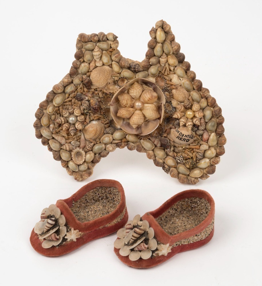 Folk art shell and sand miniature pair of shoes, together with a shell ...