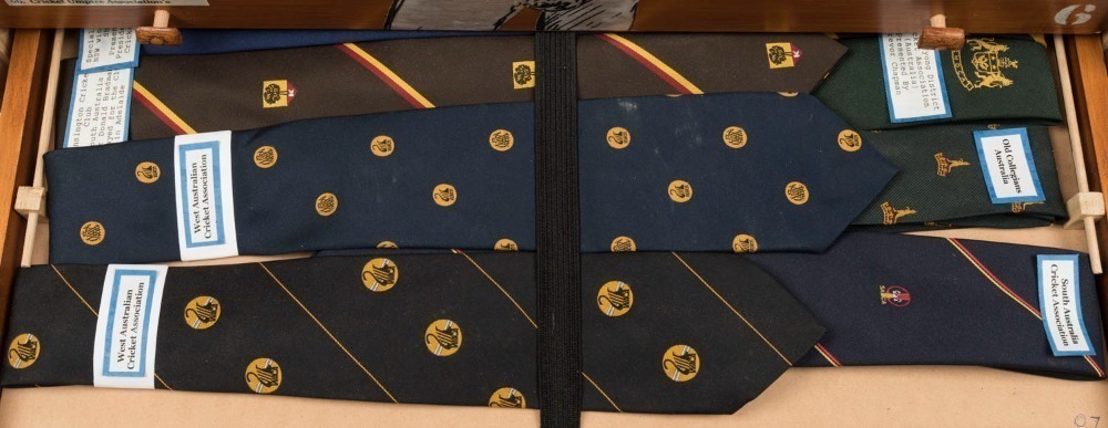 A COLLECTION OF CRICKET TIES HOUSED IN A SUPERB CUSTOM BUILT TIMBER ...