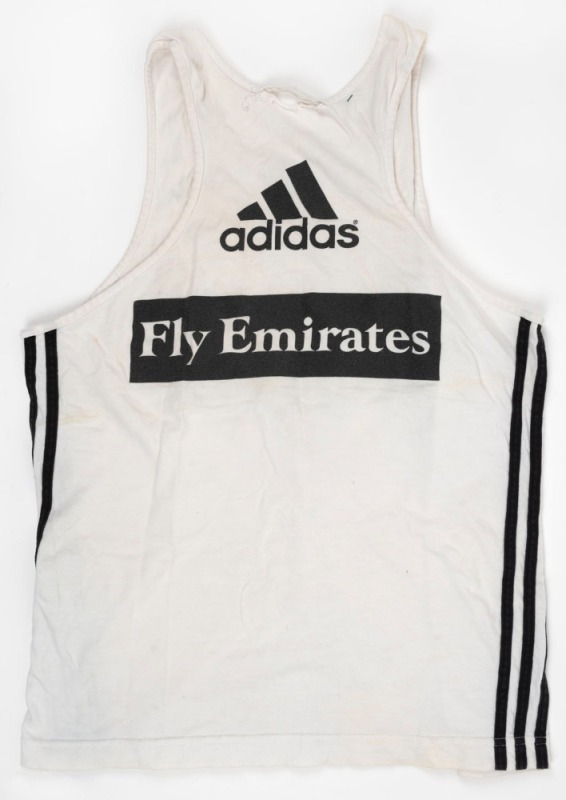 Collingwood training tops worn by Nathan Buckley; with ‘Fly Emirates ...
