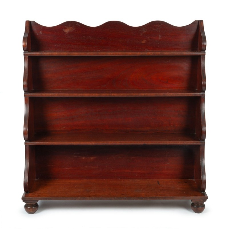An early Colonial cedar waterfall front bookcase with scalloped ...