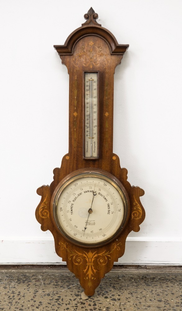 An antique English wall barometer with marquetry walnut case, the ...