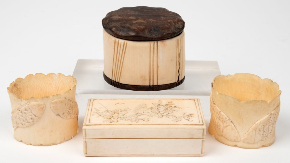 An antique Japanese carved ivory trinket box, together with an Indian ...