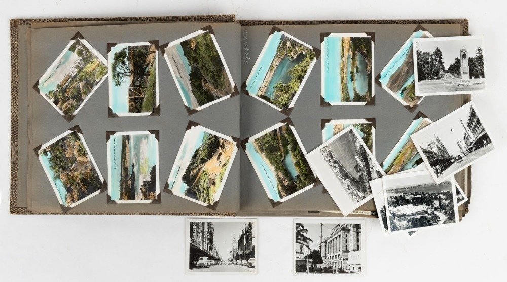 POSTCARDS: Album containing a collection of postcards and small-format ...