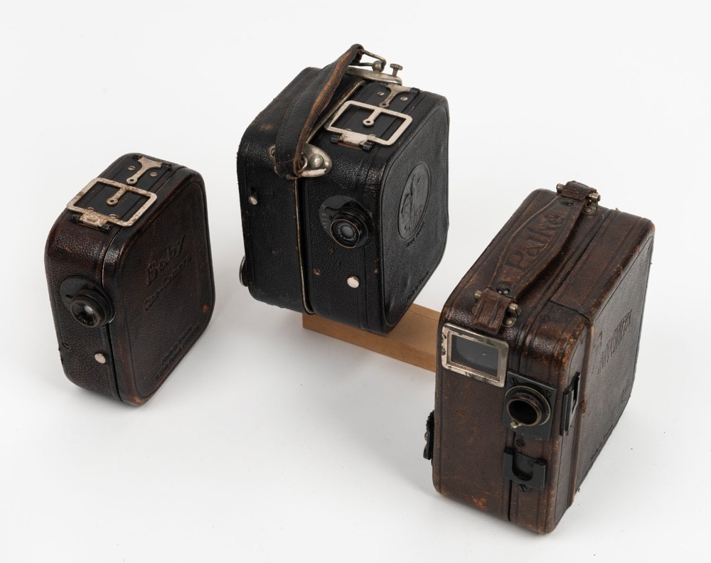 PATHÉ: Three c. 1920s 9.5mm movie cameras - one Pathé Baby Motor, one ...