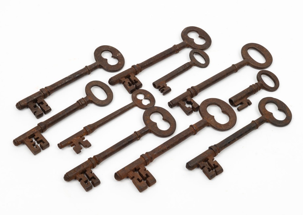 Ten assorted antique door keys, 19th century and earlier, the largest ...