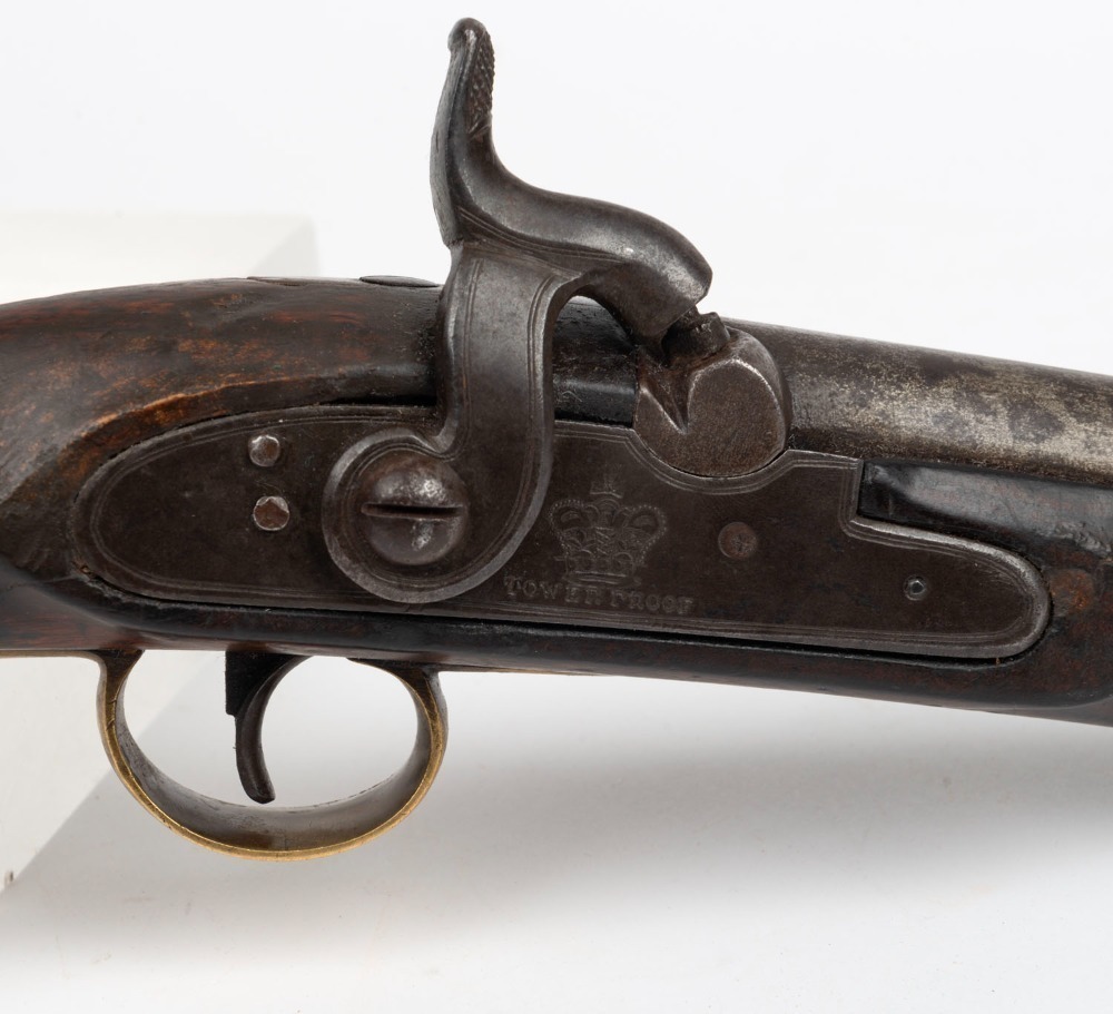 An antique English percussion cap pistol with TOWER PROOF stamp and ...