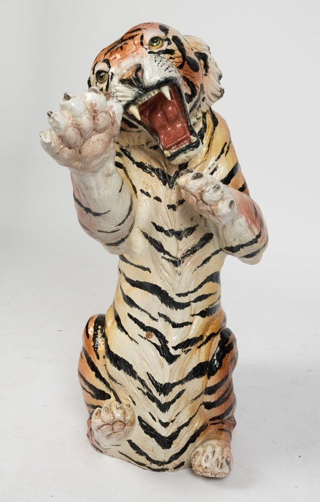 A vintage cast terracotta sculpture of a seated rampant tiger with ...