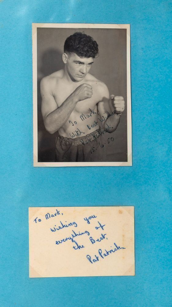 An album containing a collection of signed photographs, cards ...