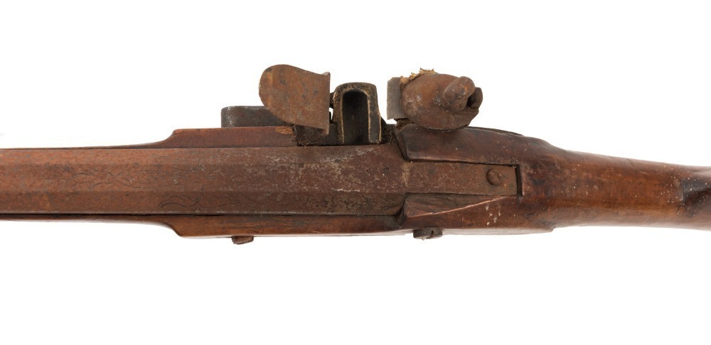 An antique flint lock Kentucky rifle with octagonal barrel, barn find ...