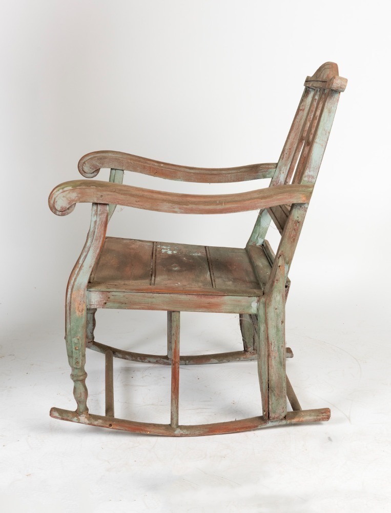 An Australian folk art rocking chair with remains of painted finish ...